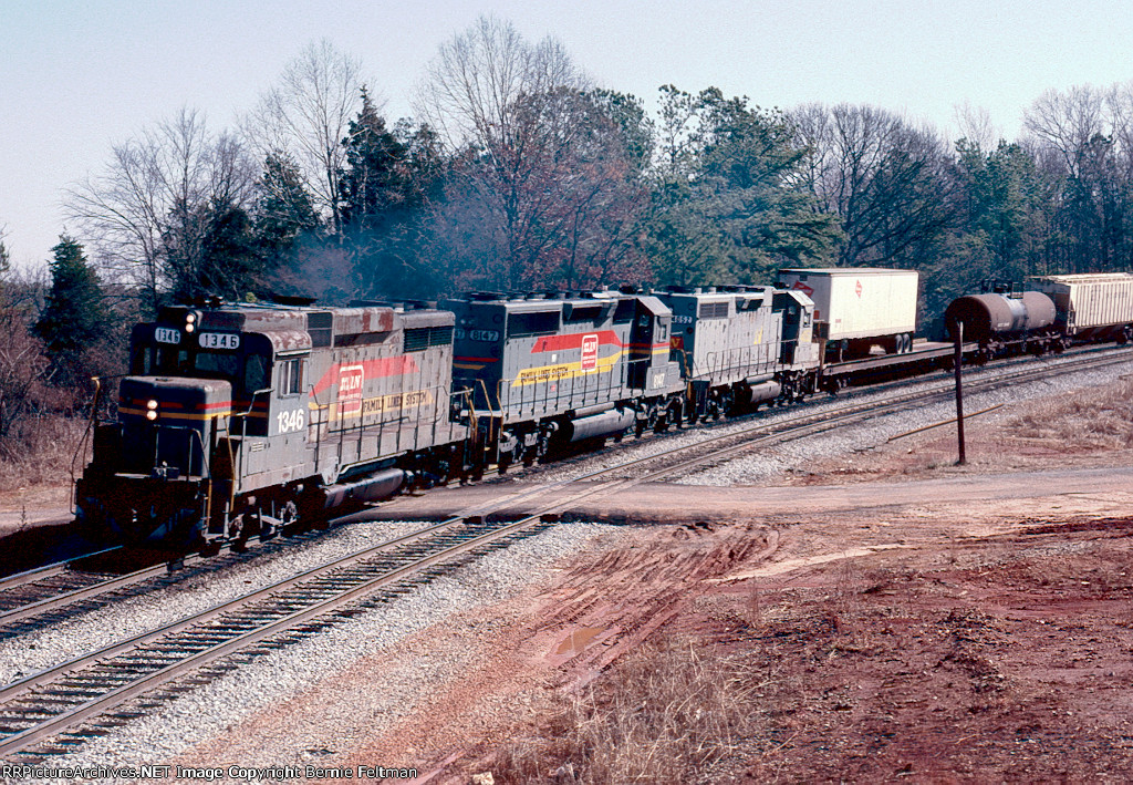 Seaboard System GP30 #1346, SD40-2 #8147 and GP38-2 #4052 lead a northbound freight on the ...